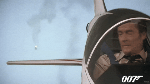 Flying Roger Moore GIF by James Bond 007 - Find & Share on GIPHY