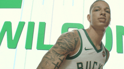 Turn Around Smile GIF by Milwaukee Bucks - Find & Share on GIPHY