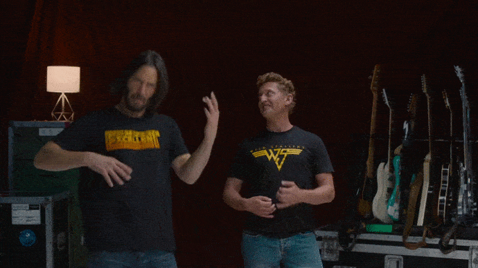 Keanu Reeves Air Guitar GIF by Weezer - Find & Share on GIPHY