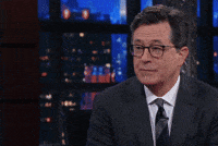 Stephen Colbert Eating Popcorn Gif