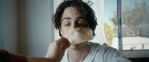 Face Mask GIF by The Orchard Films - Find & Share on GIPHY