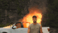 Guy Walking Away From Explosion Gif