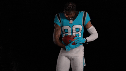 Holding Football GIFs - Get the best GIF on GIPHY