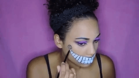 Cheshire Cat Halloween Costume GIF by StyleHaul - Find & Share on GIPHY